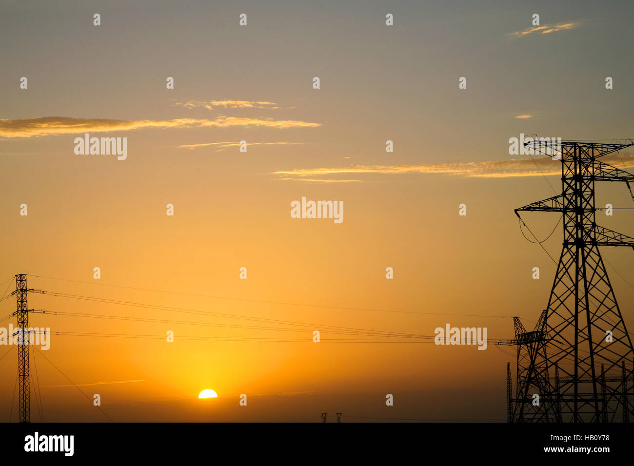 Silhouette of high voltage electrical pole structures in Namibia Stock ...