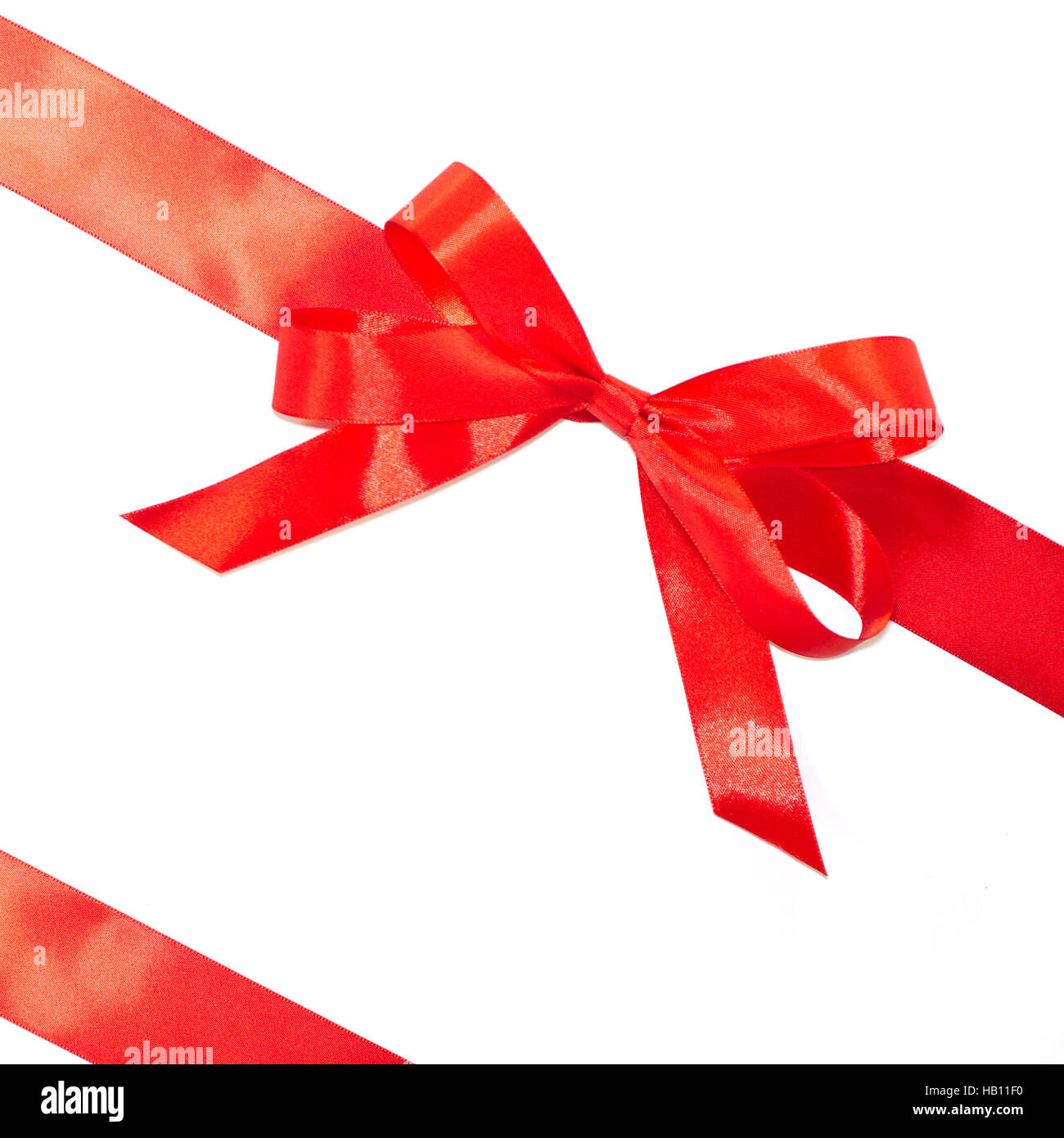 Red bow and diagonal ribbons with tails isolated on white background ...