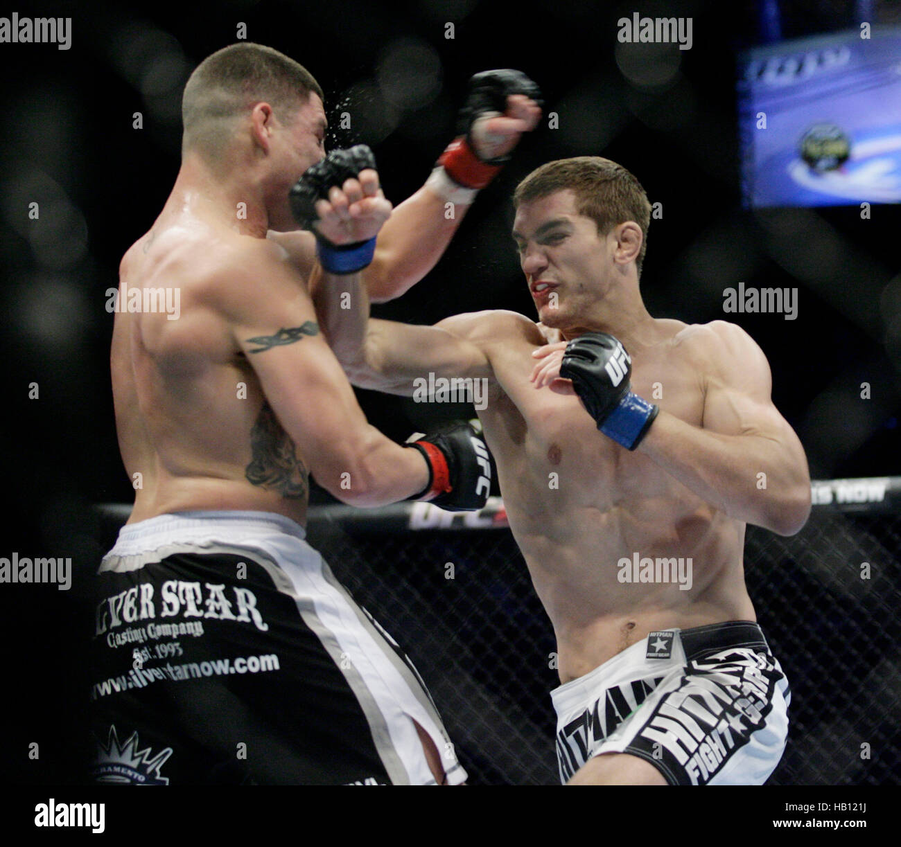 UFC fighter John Hathaway, right, fights Diego Sanchez at UFC 114 on ...