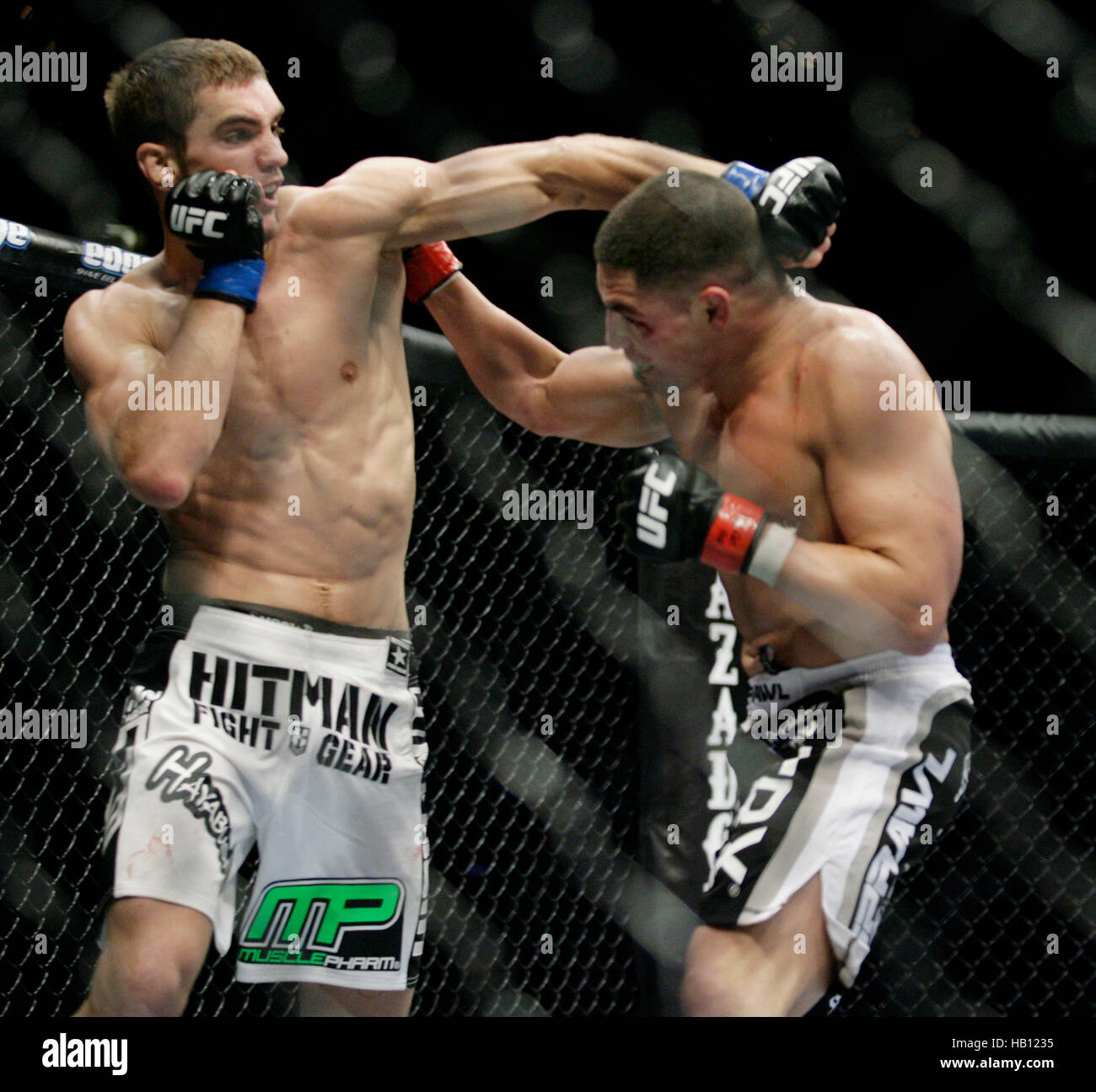 UFC fighter John Hathaway, left, fights Diego Sanchez at UFC 114 on May ...