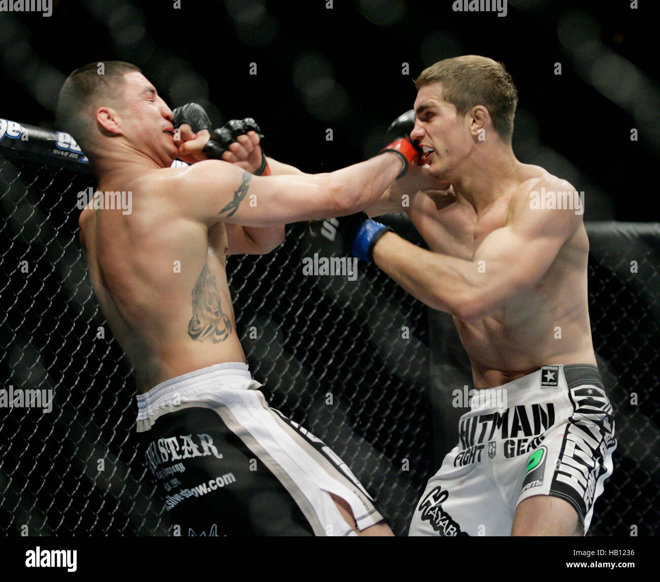 UFC fighter John Hathaway, right, fights Diego Sanchez at UFC 114 on ...
