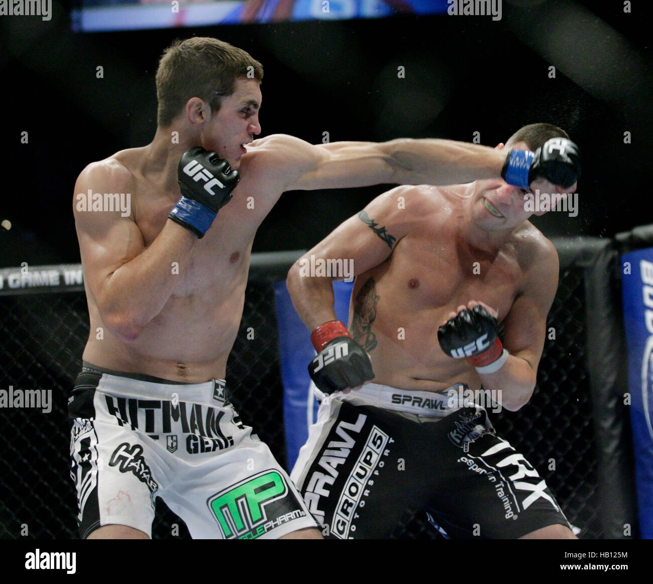 UFC fighter John Hathaway, left, fights Diego Sanchez at UFC 114 on May ...