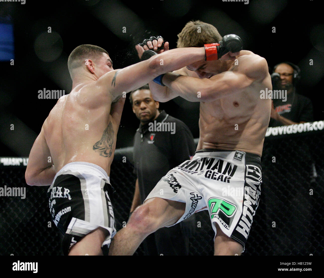 UFC fighter John Hathaway, right, fights Diego Sanchez at UFC 114 on ...
