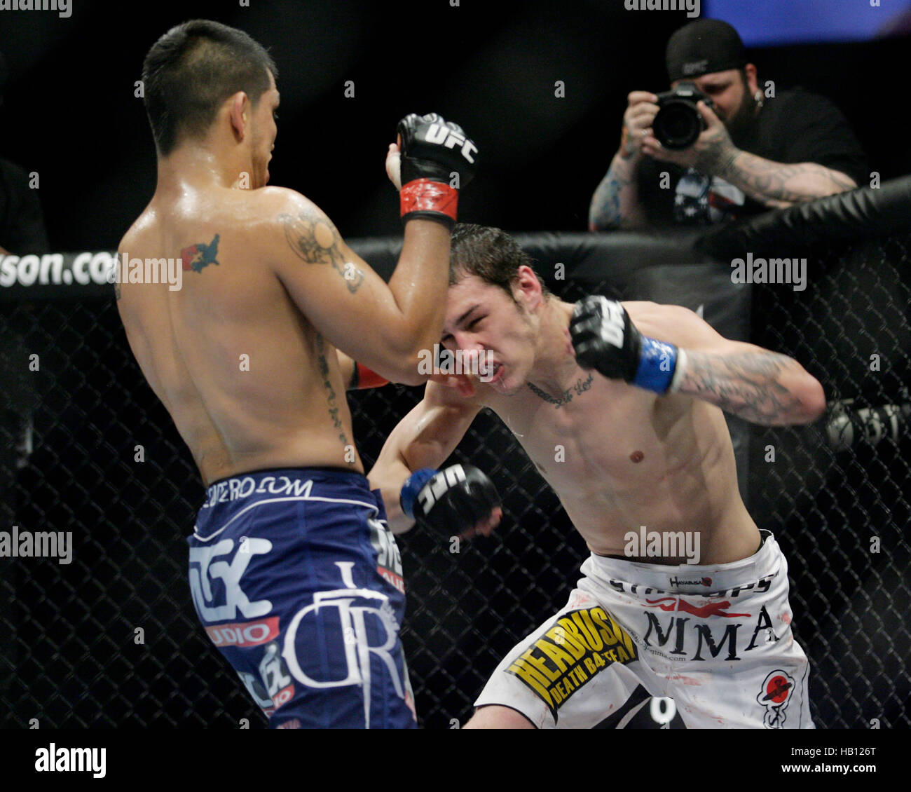 UFC fighter Dan Lauzon, right, fights Efrain Escudero at UFC 114 on May ...