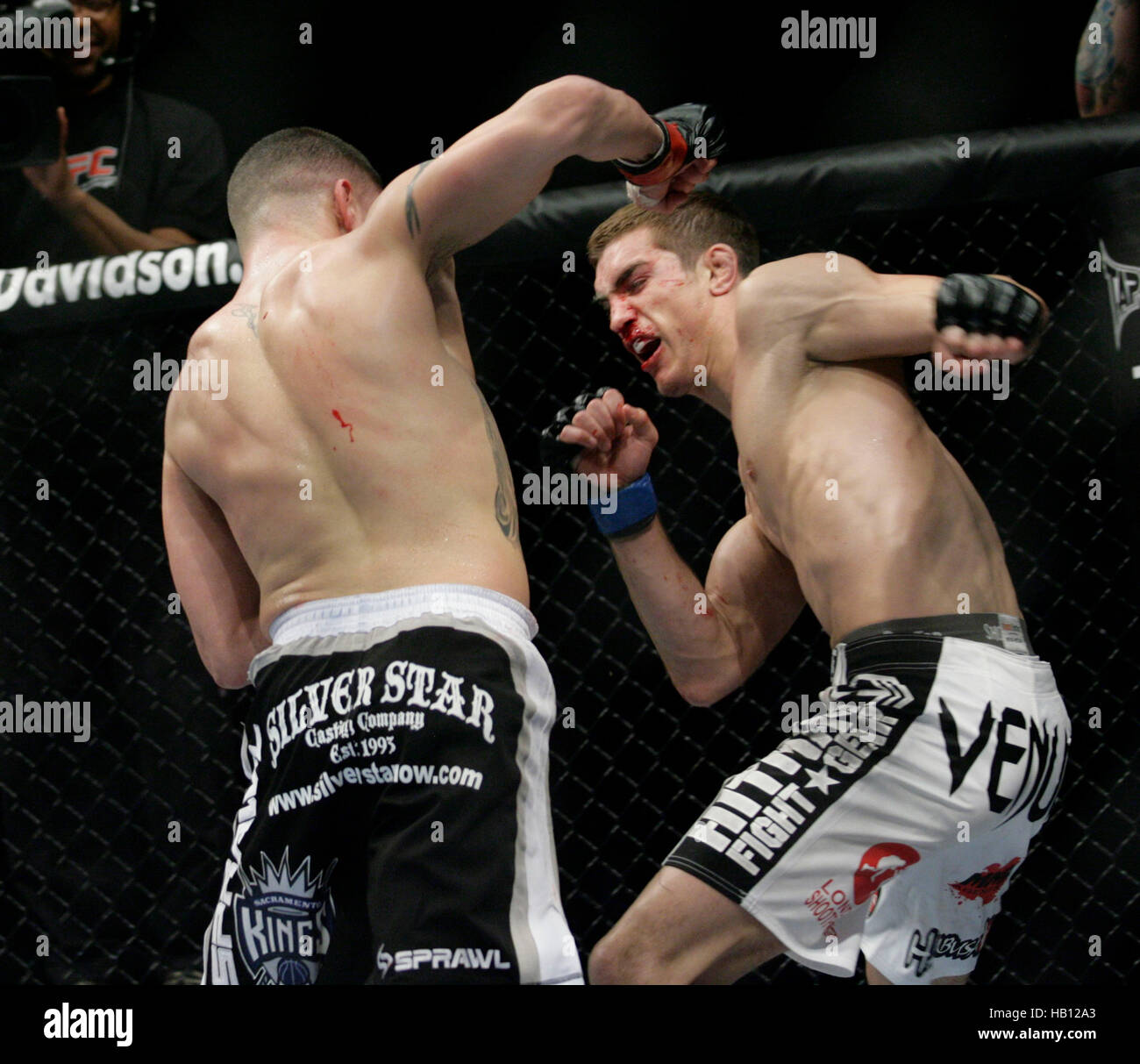 UFC fighter John Hathaway, right, fights Diego Sanchez at UFC 114 on ...