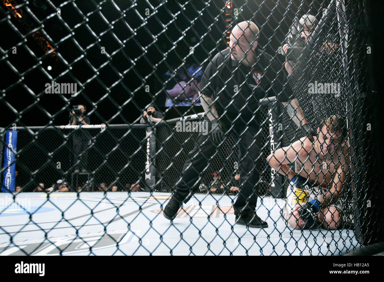 UFC fighter Dan Lauzon doubles in pain after being kicked in the groin ...