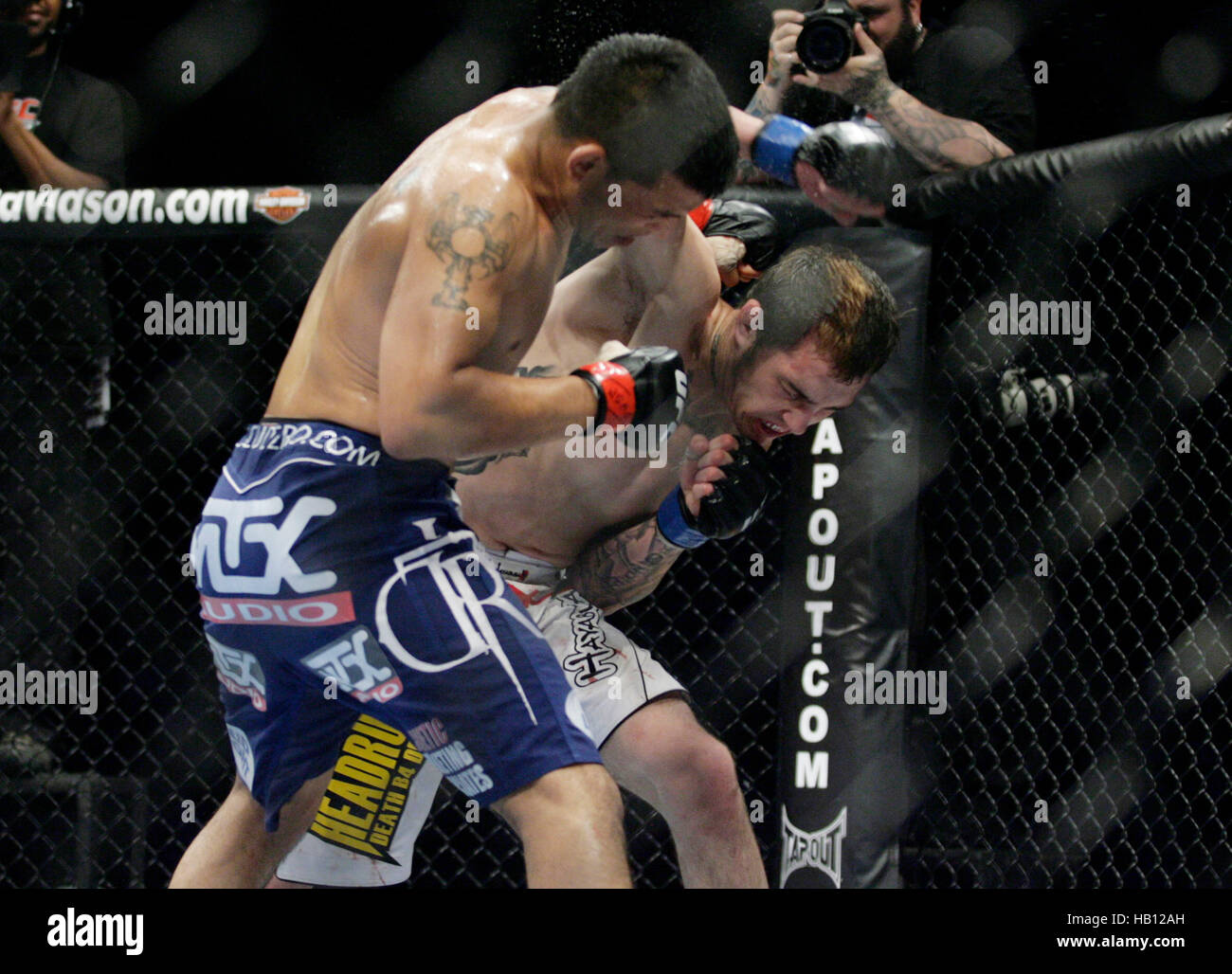 UFC fighter Dan Lauzon, right, fights Efrain Escudero at UFC 114 on May ...