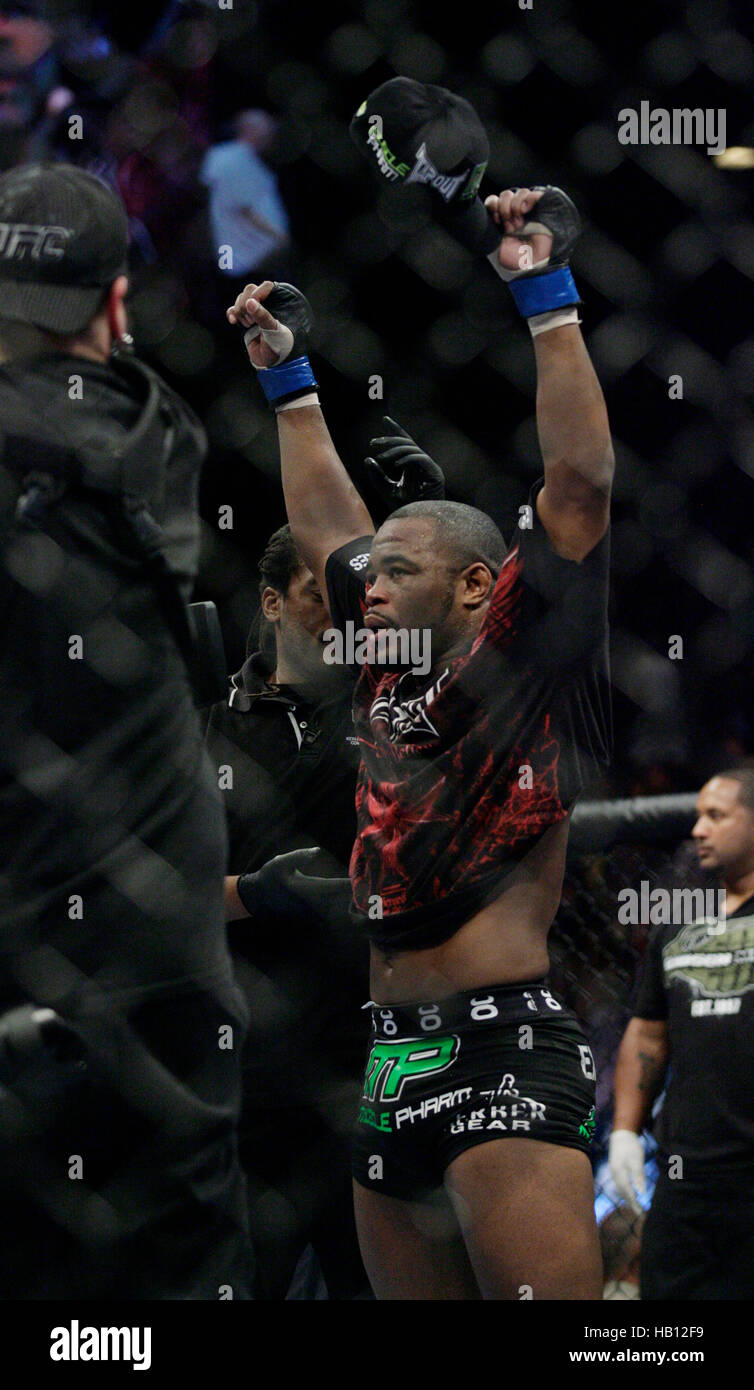 UFC fighter Rashad Evans raises his arms after defeating Quinton ...