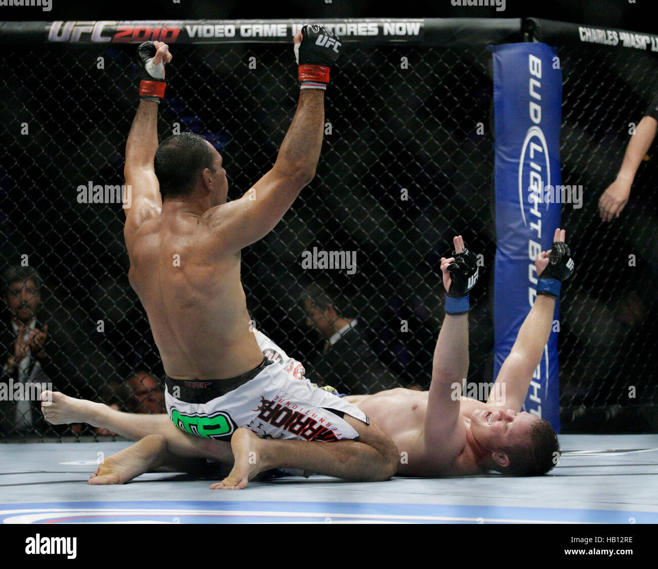 UFC fighter Jason Brilz, right, and Antonio Rogerio Nogueira raise ...