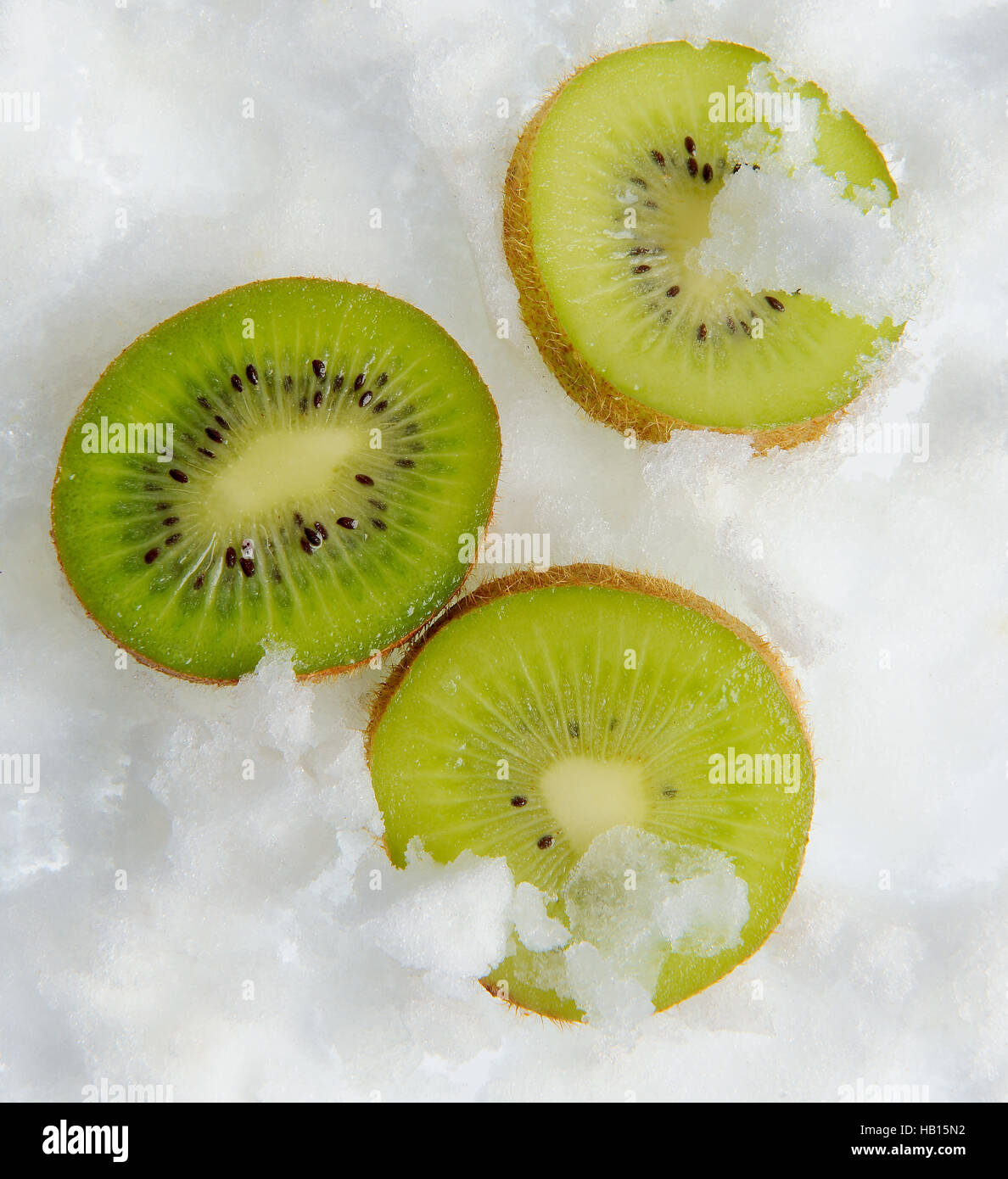 Tasty, frozen, colorful fruit on snow background Stock Photo - Alamy