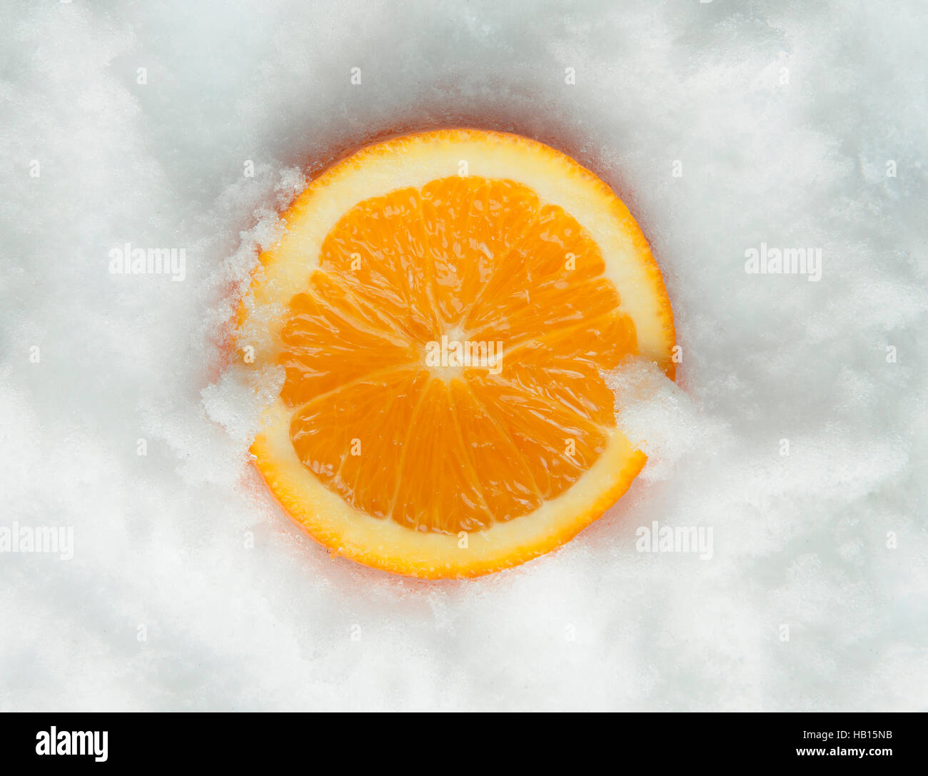 Tasty, frozen, colorful fruit on snow background Stock Photo - Alamy