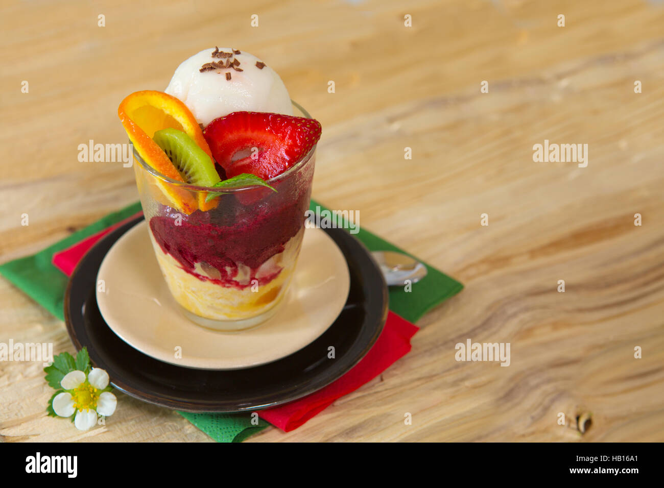 Mixed ice cream with fruits Stock Photo - Alamy