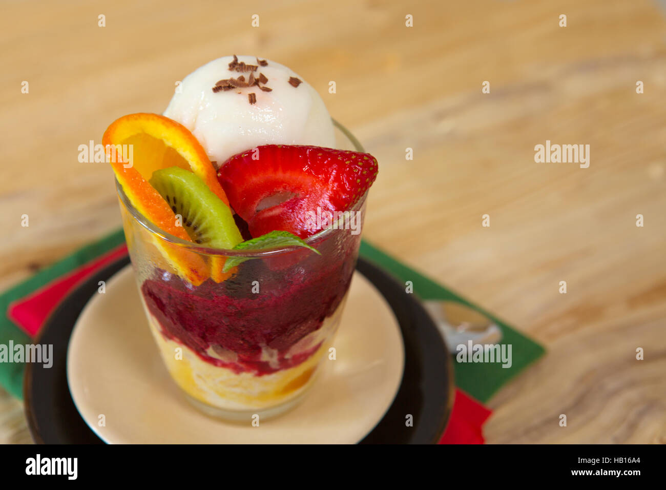 Mixed ice cream with fruits Stock Photo - Alamy