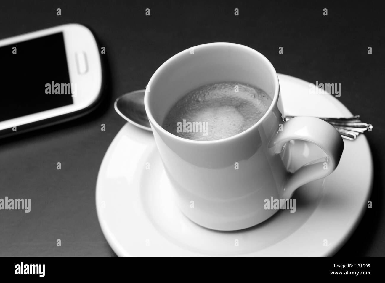 espresso cup and smartphone Stock Photo - Alamy