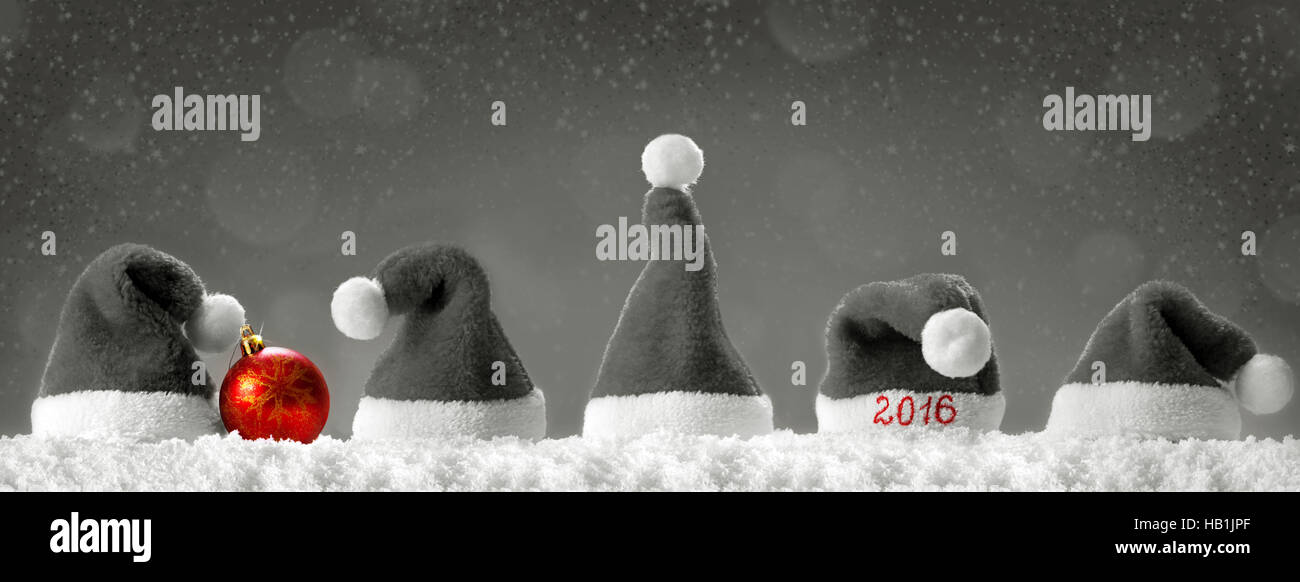 Seven red santa hats Stock Photo - Alamy