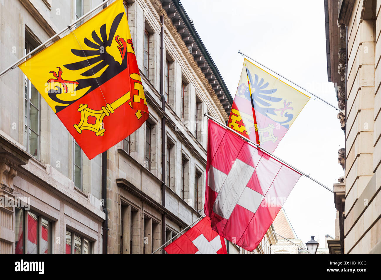 Geneva city, Switzerland. Swiss National and City flags mounted on old ...