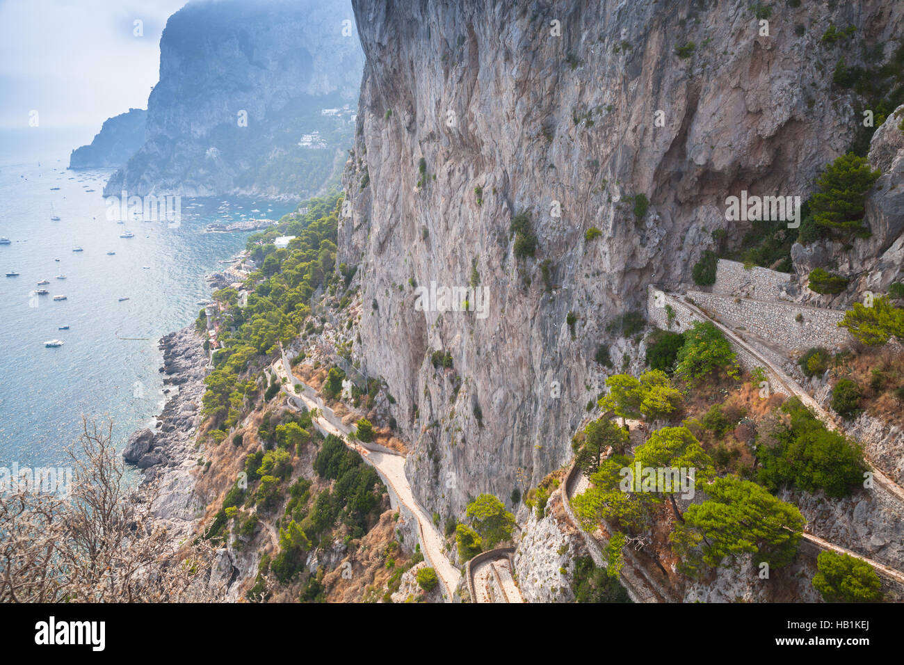 Coastal mountain road on rocks of Capri island, Italy Stock Photo - Alamy