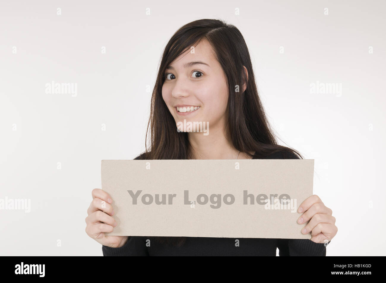 girl with logo sign left Stock Photo - Alamy
