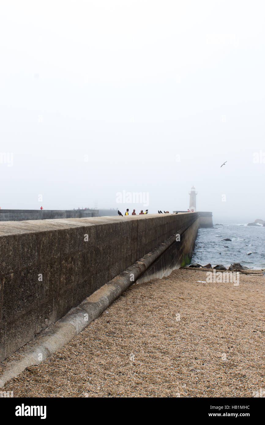Lighthouse on the beach Stock Photo - Alamy