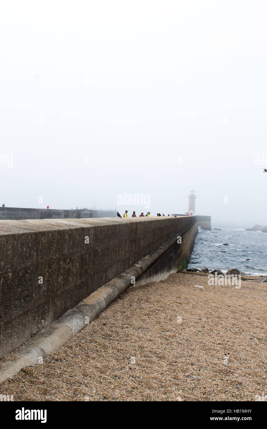 Lighthouse on the beach Stock Photo - Alamy