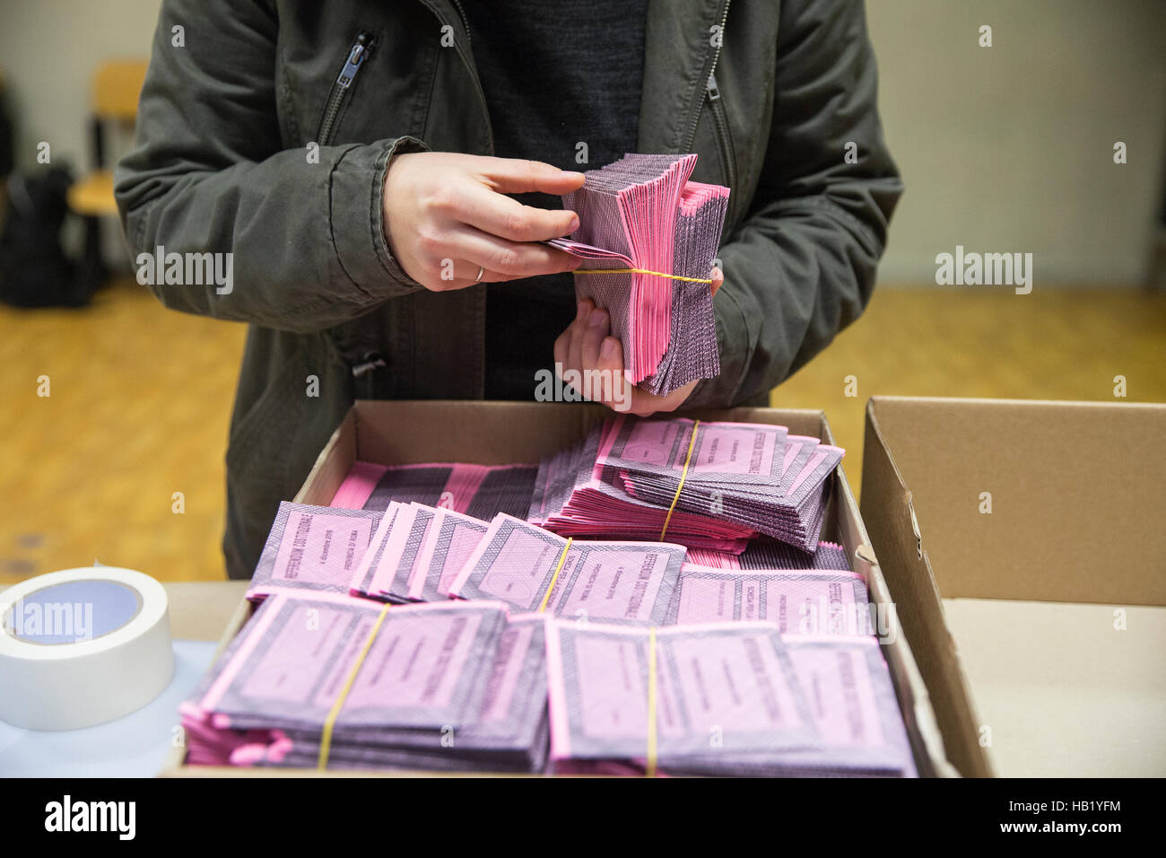 Rome, Italy. 03rd Dec, 2016. An official stamps ballot papers at a ...