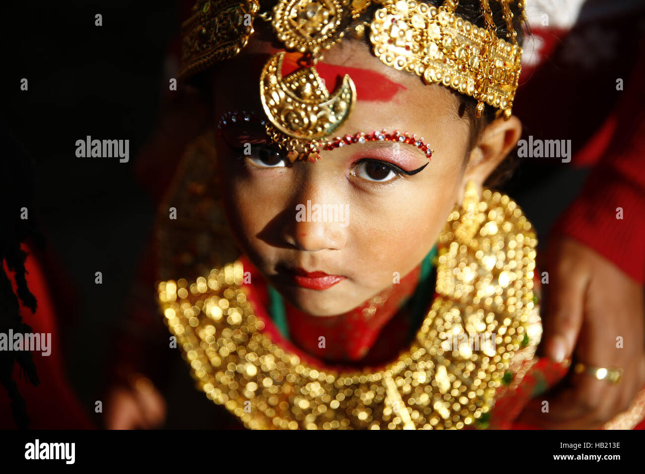 Bhaktapur, Nepal. 4th Dec, 2016. A Nepalese Newar girl looks on during ...