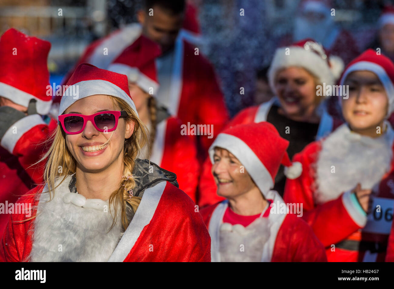 London, UK. 4th Dec, 2016. The finish brings relief and a shower of ...
