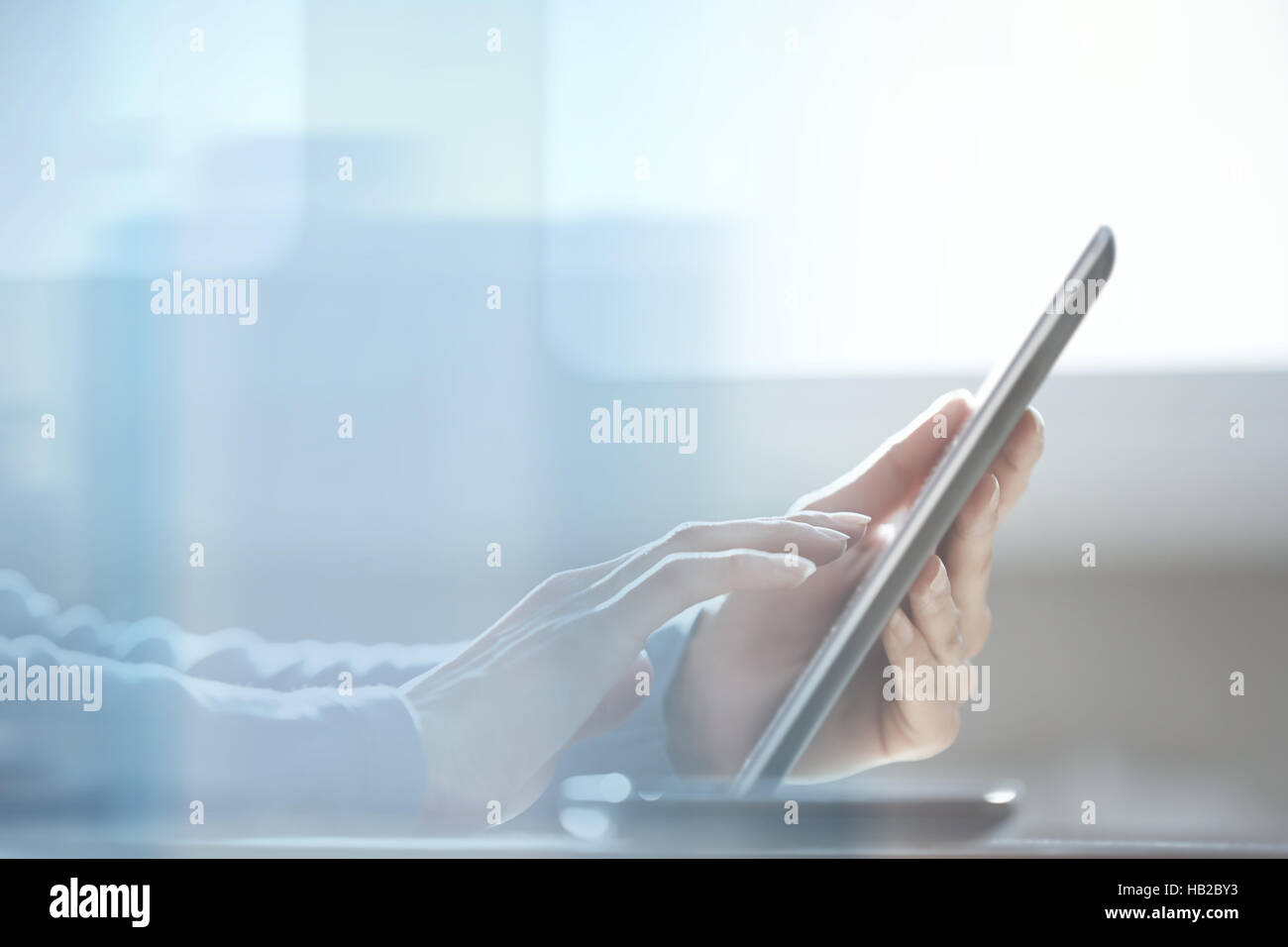 Tablet computer user Stock Photo - Alamy