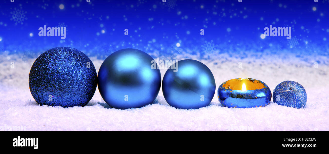 Advent candle and blue Christmas balls Stock Photo - Alamy