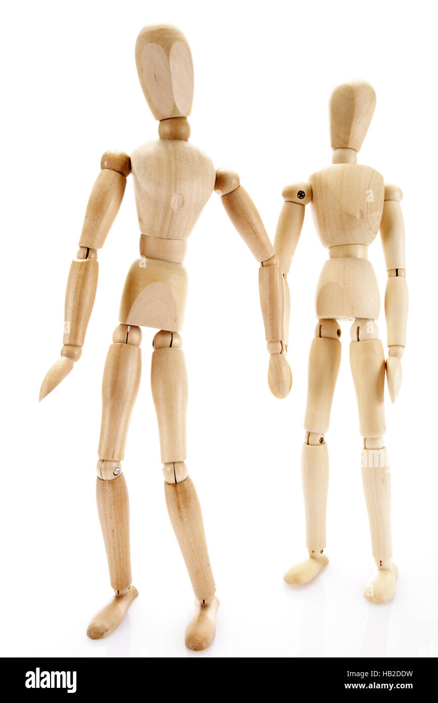 Two wooden jointed figures behind one another Stock Photo - Alamy