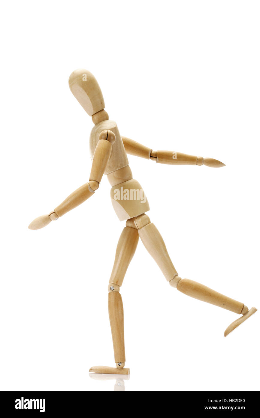 Wooden jointed figure walking Stock Photo - Alamy