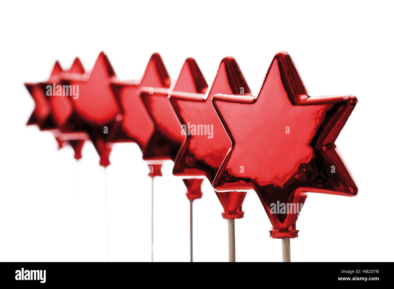 Red stars on sticks Stock Photo - Alamy