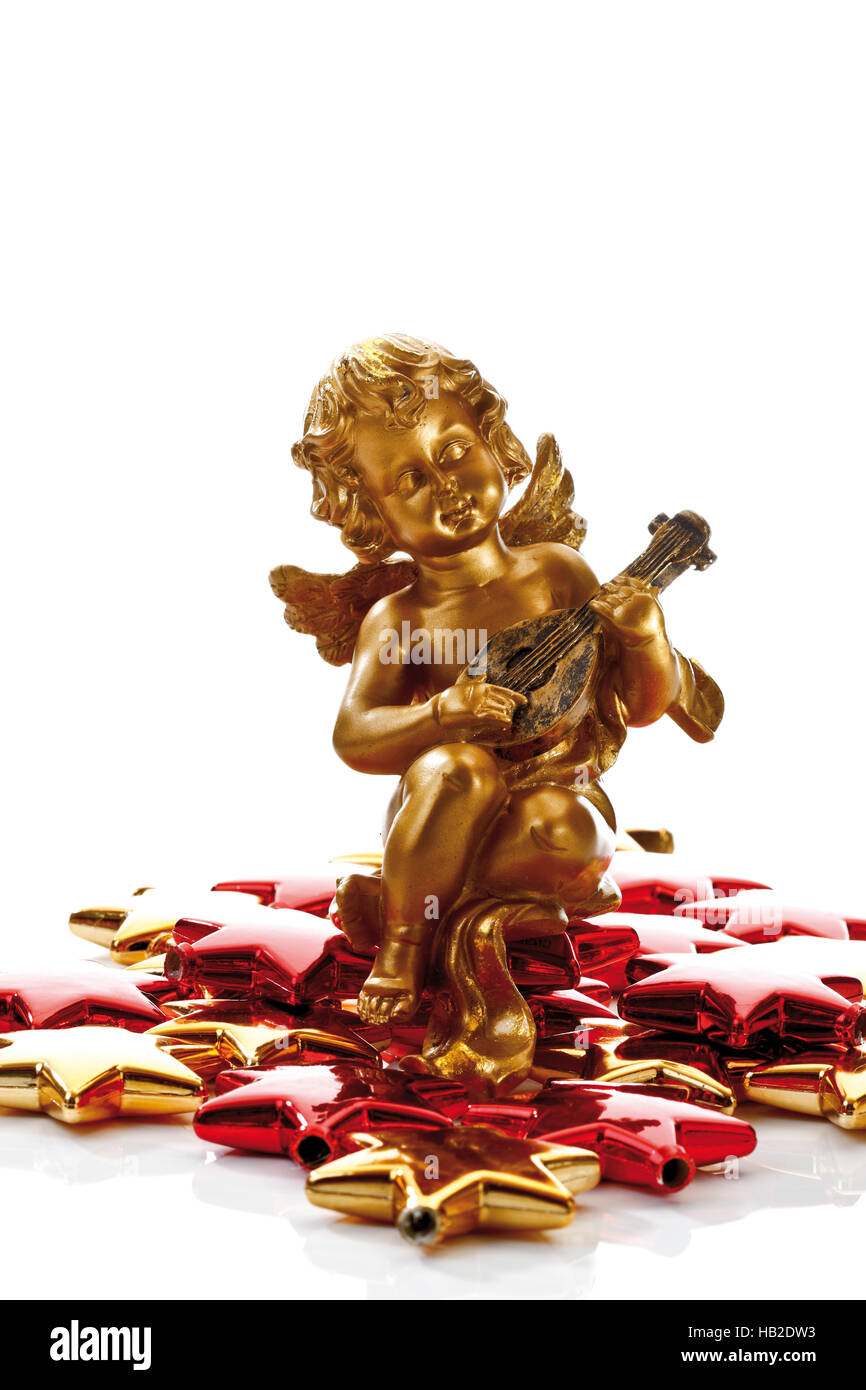 Red and golden stars and an angel Stock Photo - Alamy