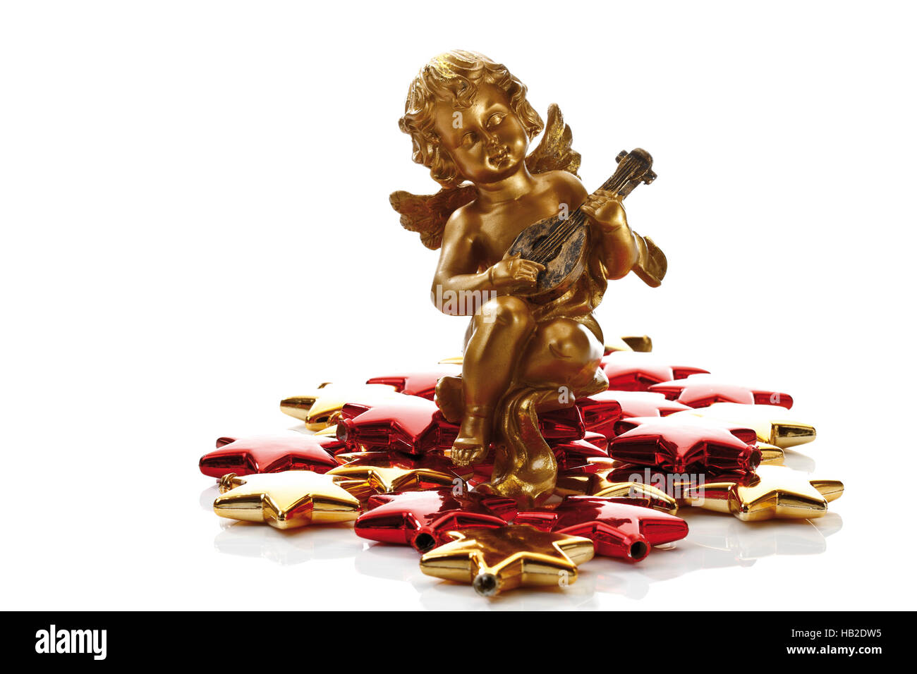 Red and golden stars and an angel Stock Photo - Alamy