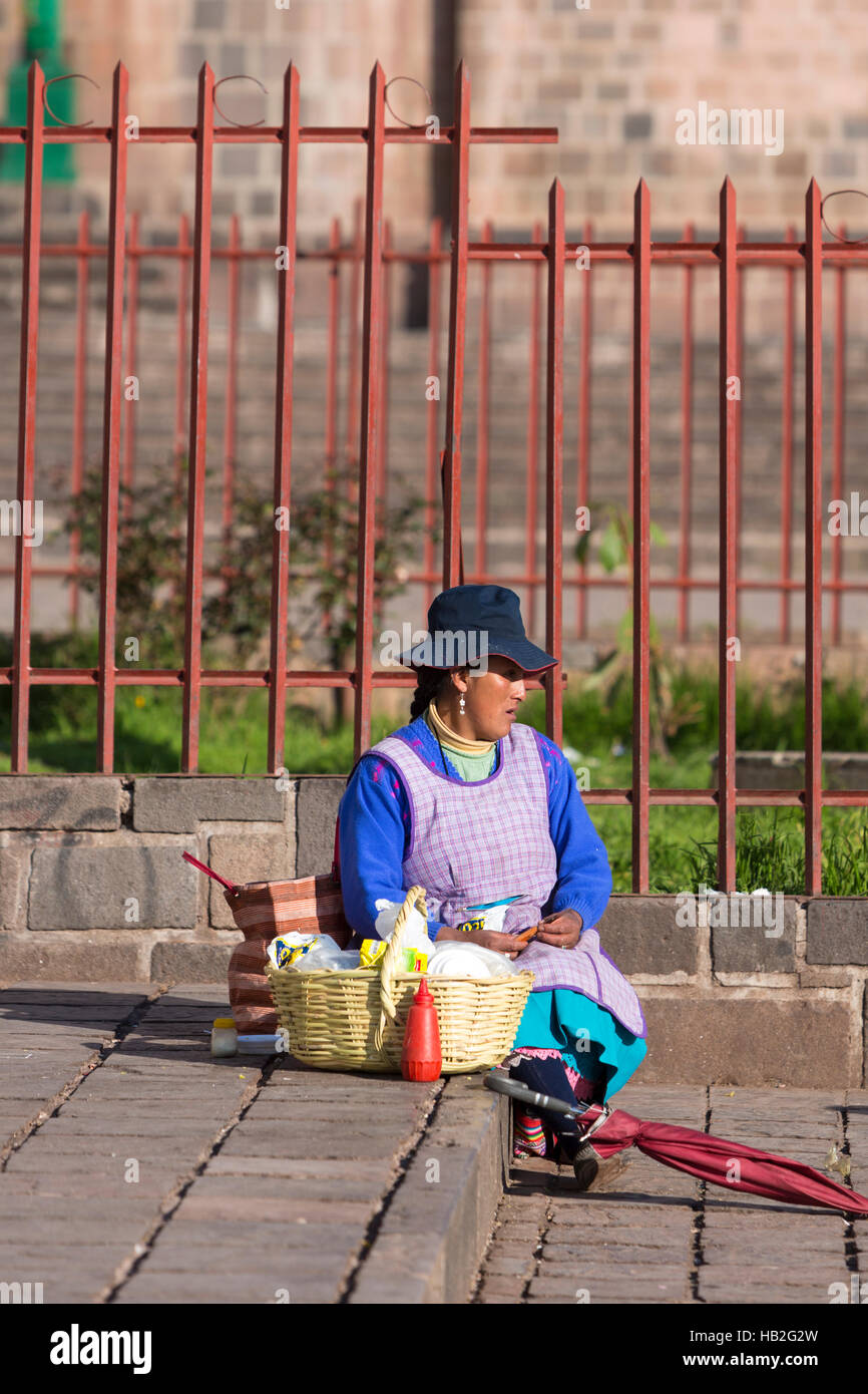 CUSCO, PERU, JANUARY 15: Peruvian woman with hat sitting selling ...