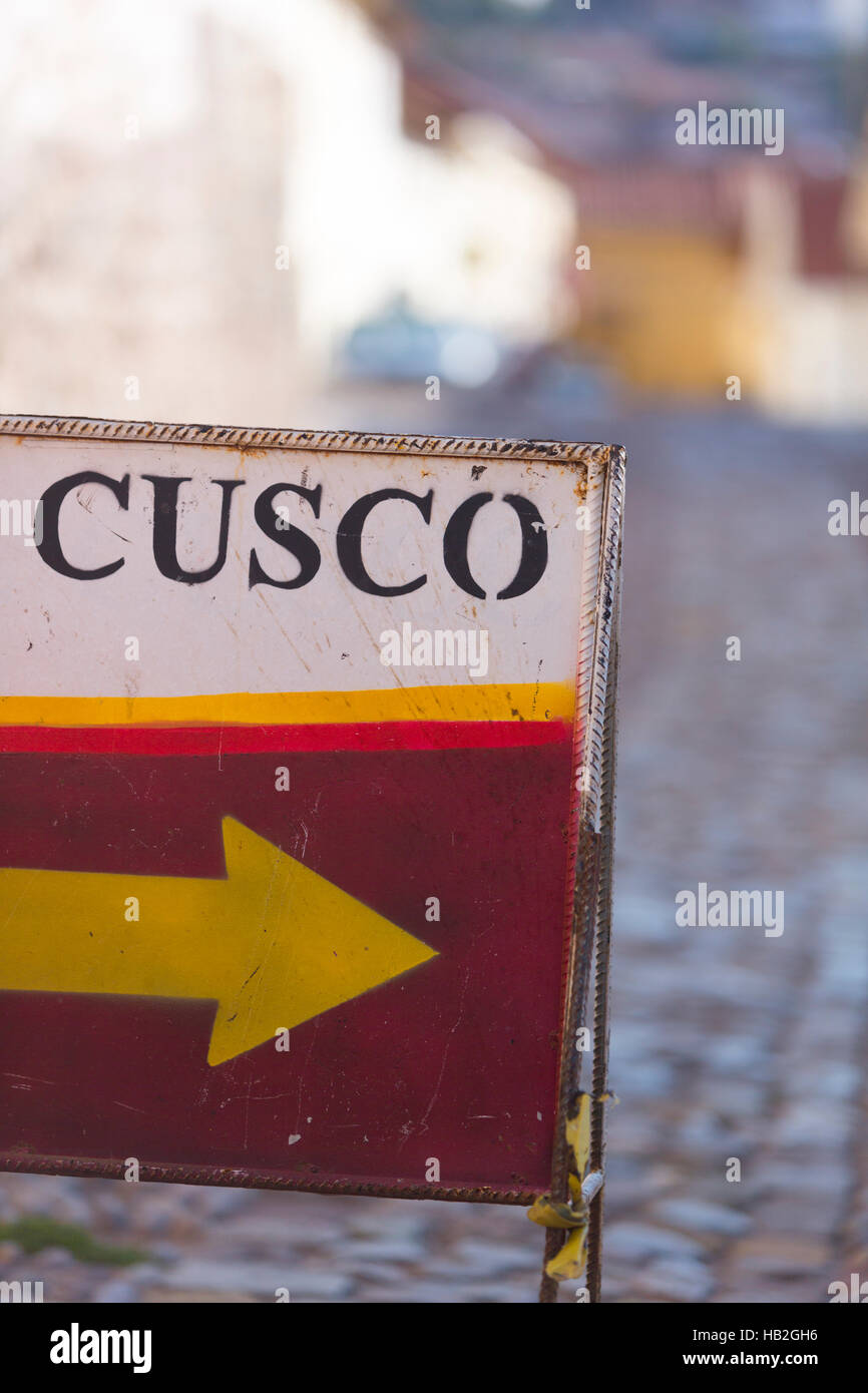 Cusco Urban board sign with arrow in Peru Stock Photo - Alamy