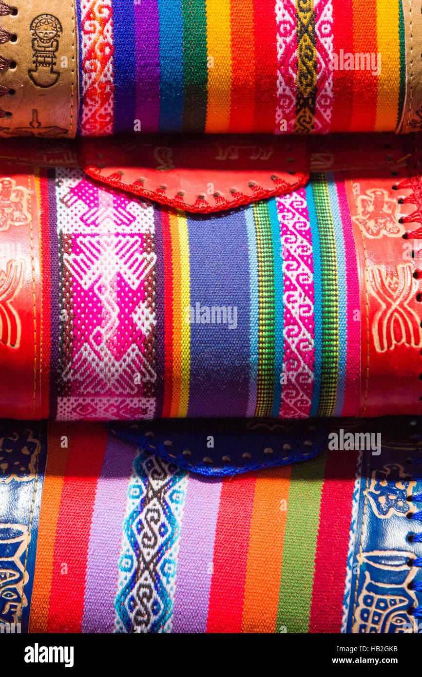 Woolen and leather colored bags hanging at market of Cusco, Peru Stock ...