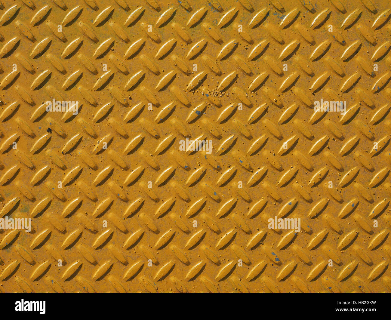 Yellow steel diamond plate background Stock Photo - Alamy