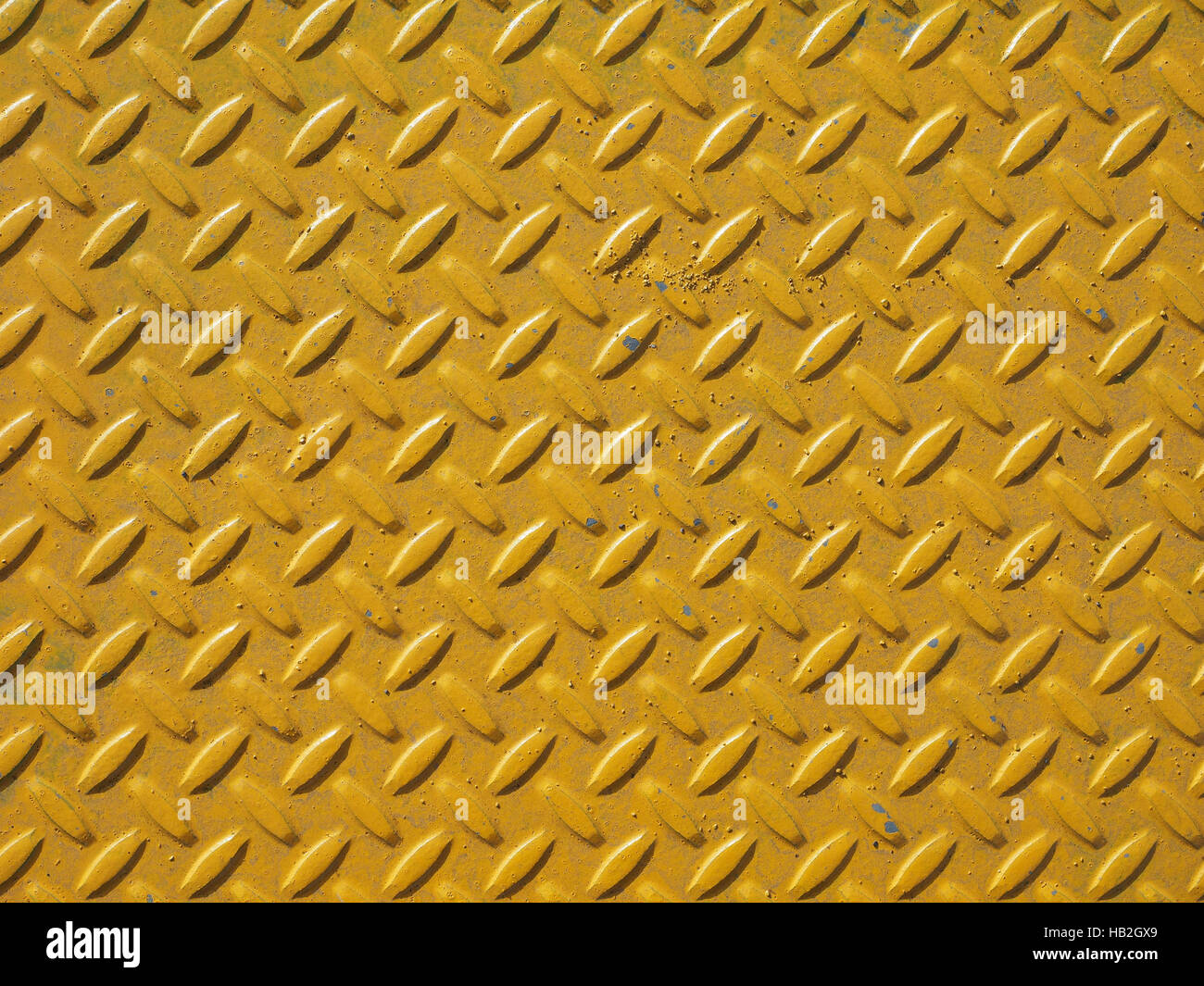 Yellow steel diamond plate background Stock Photo - Alamy