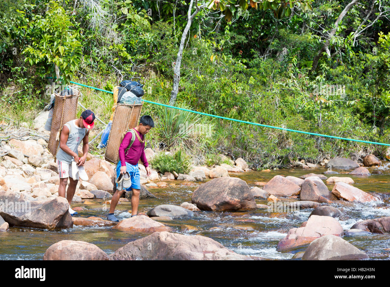 MT RORAIMA,VENEZUELA, APRIL 1: Two local Indian native guides crossing ...