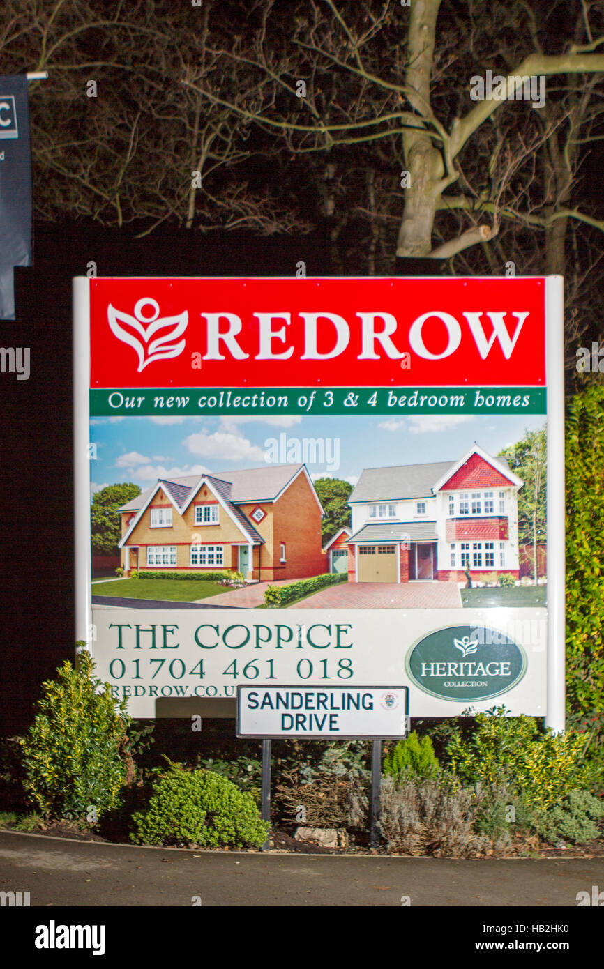 Signs for a 'Redrow' new build houses construction site, Southport ...