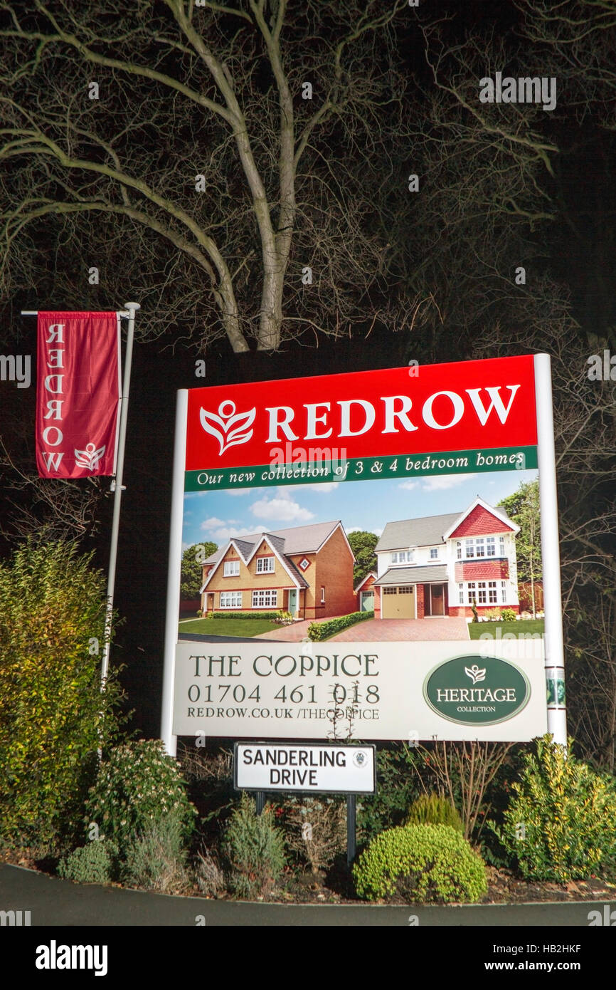 Signs for a 'Redrow' new build houses construction site, Southport ...