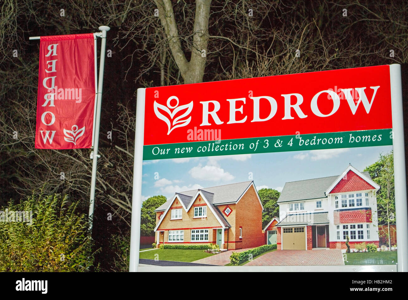 Signs for a 'Redrow' new build houses construction site, Southport ...