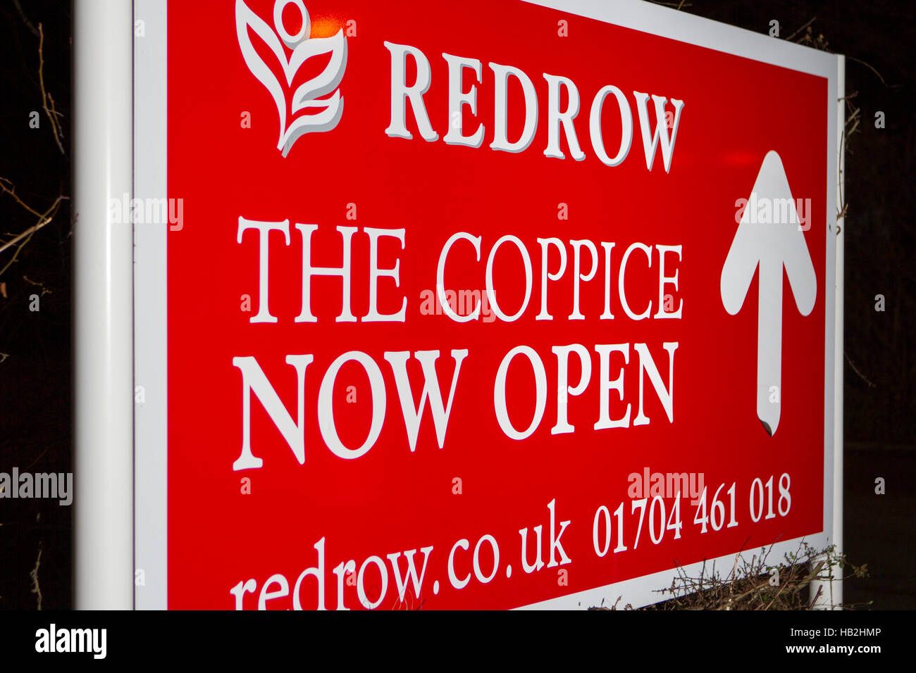 Signs for a 'Redrow' new build houses construction site, Southport ...