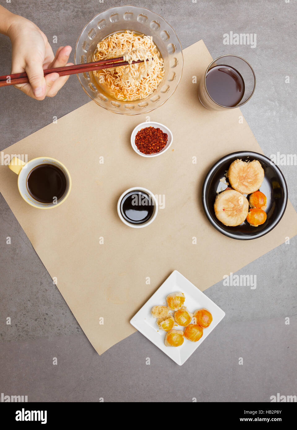 Hands grabbing food hi-res stock photography and images - Alamy