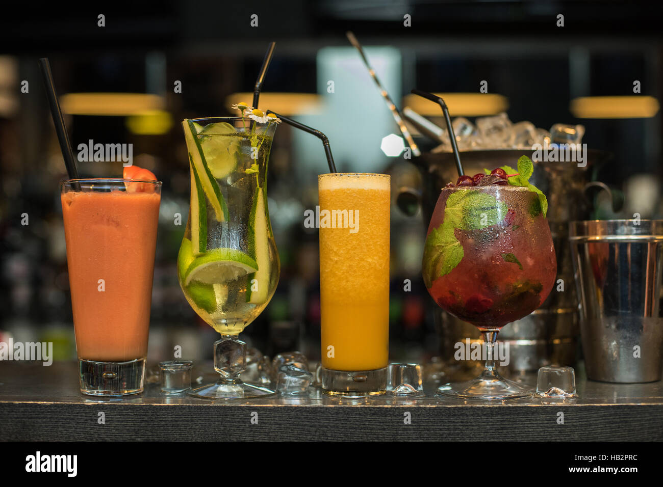 cocktails on bar background Stock Photo - Alamy