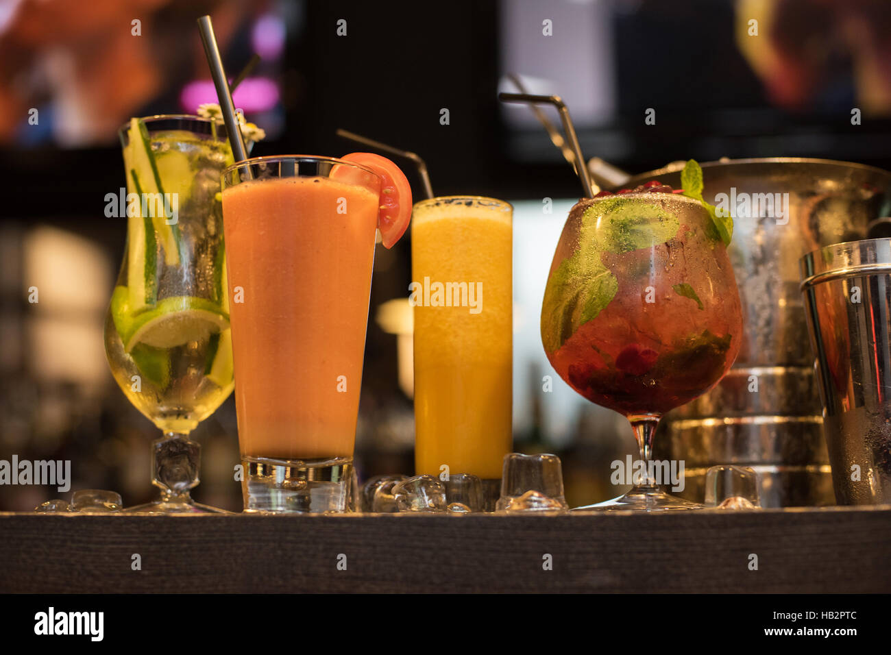 cocktails on bar background Stock Photo - Alamy