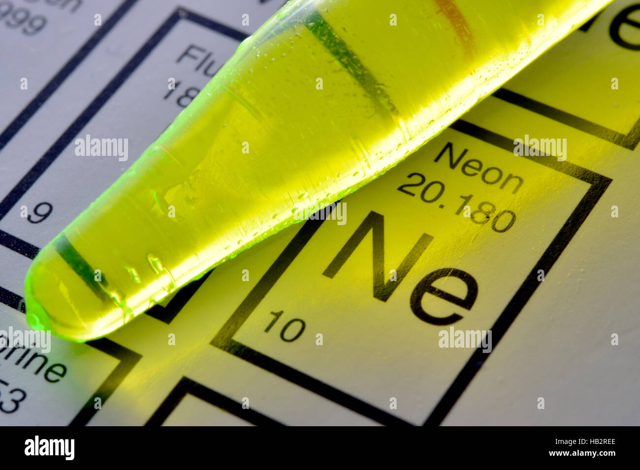 yellow neon chemistry on period table Stock Photo - Alamy