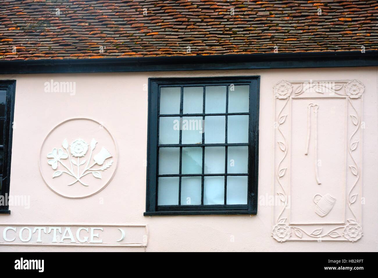 Cottage Pink Pargeting Stock Photo - Alamy