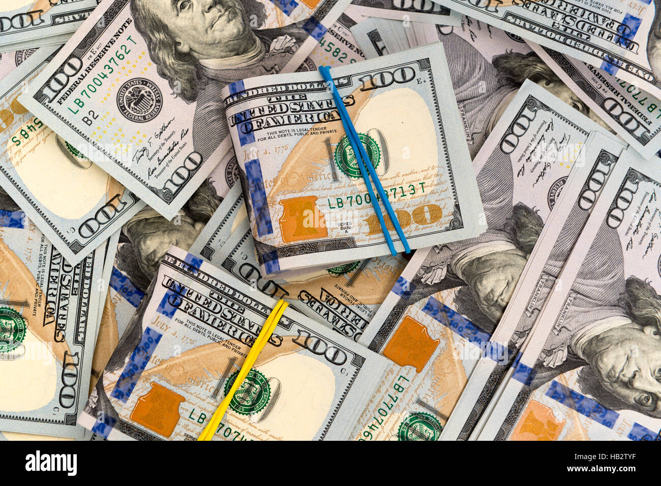 Heap of money in dollars cash banknotes on surface Stock Photo - Alamy
